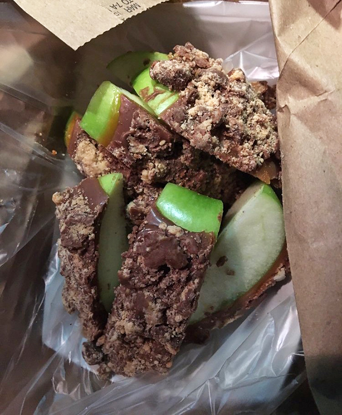 These chocolate-dipped apple slices aren't just dessert—they're edible art. Somehow they make you feel virtuous while indulging. That's talent.