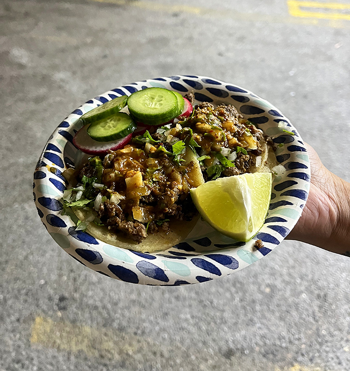 Carne asada that would make your abuela proud, topped with enough lime, radish, and cucumber to convince yourself it's practically a salad.