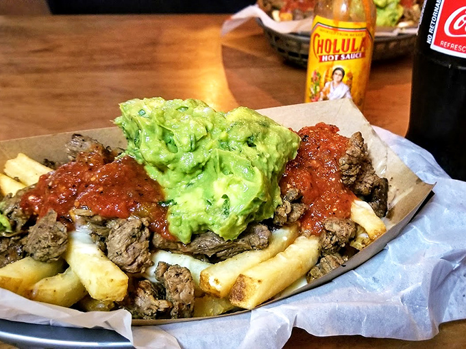 Carne asada fries that could make a potato proud. That mountain of guacamole isn't just garnish &ndash; it's a statement of generosity rarely seen outside family gatherings.
