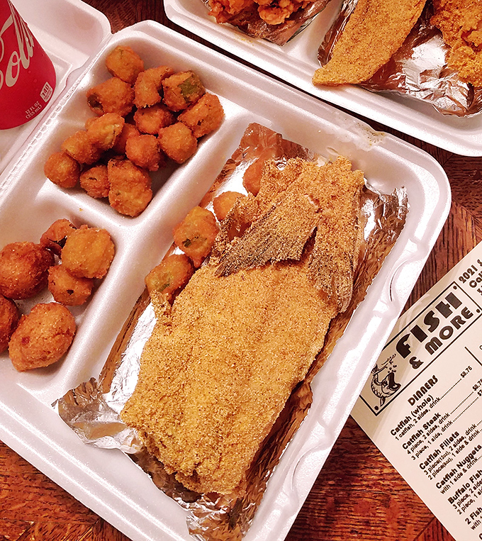 This isn't just dinner&mdash;it's edible architecture. Layers of golden-fried catfish, crispy hushpuppies, and fries create a comfort food masterpiece.