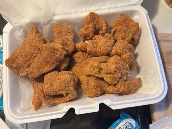 Catfish nuggets with that ideal crunch-to-tender ratio. Each golden morsel is like a little treasure chest of flavor that makes you wonder why you'd eat seafood anywhere else.