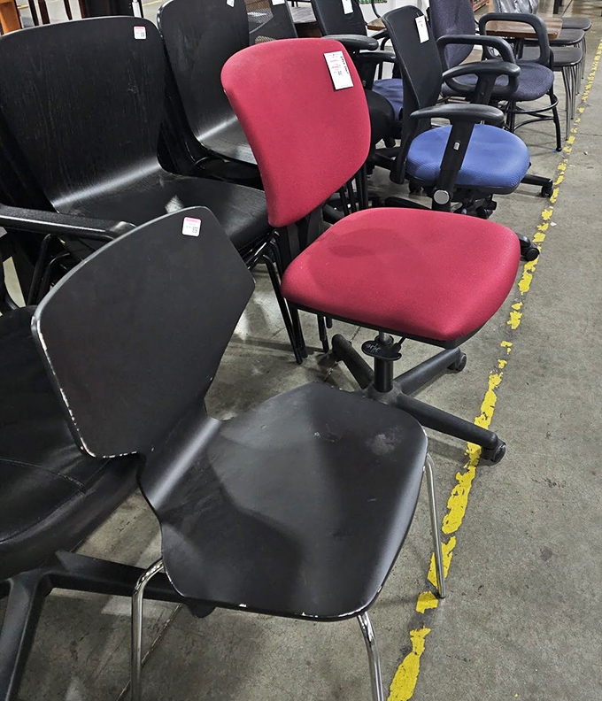 The chair lineup looks like a corporate meeting gone rogue. That red office chair might just be your next work-from-home salvation.