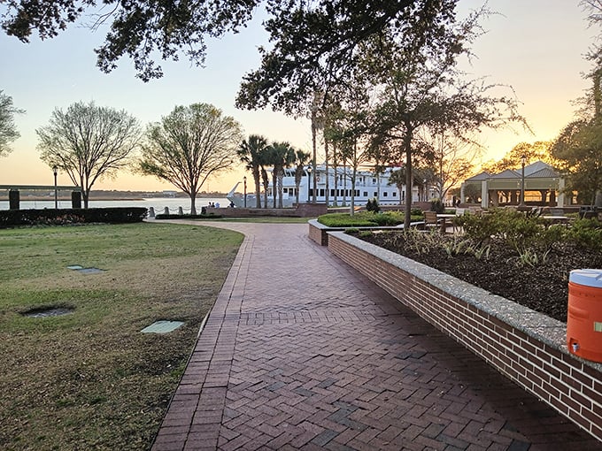 Waterfront Park's brick pathways lead visitors toward postcard-worthy views. As the sun sets, this becomes Beaufort's front porch where memories are made with every step.