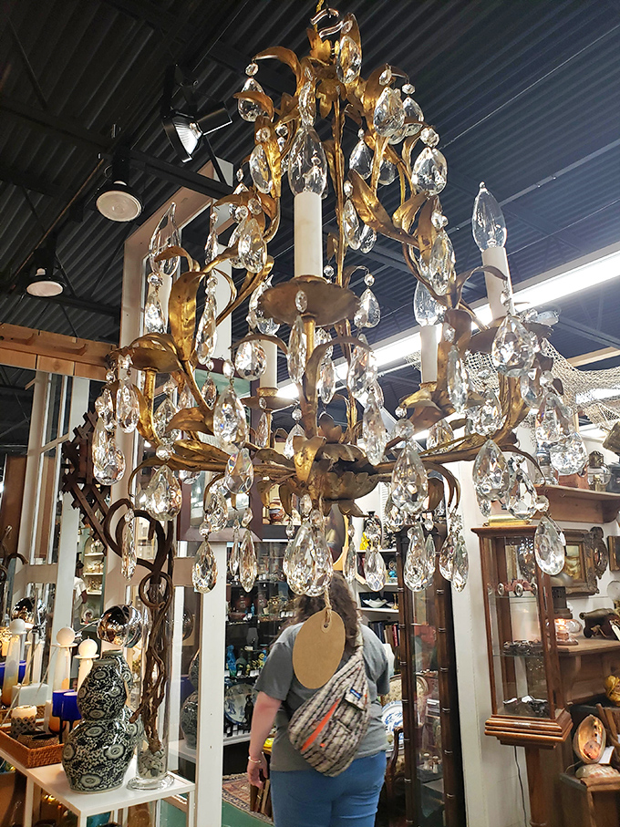 Dripping with crystal and gilded elegance, this chandelier isn't just lighting&mdash;it's jewelry for your ceiling.