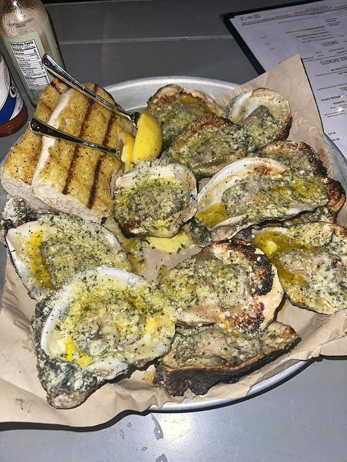 These charbroiled oysters aren't just cooked, they're transformed. Buttery, garlicky treasures that might convert even the most stubborn oyster skeptics.