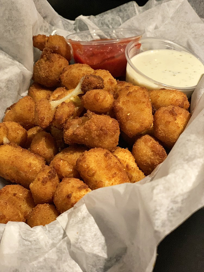 Golden-fried cheese curds that squeak between your teeth&mdash;the most delightful sound this side of the apocalypse. Dipping sauces add drama.