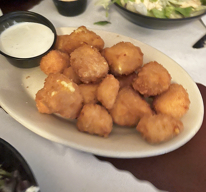 Golden cheese curds that squeak between your teeth&mdash;the ultimate Wisconsin appetizer that turns first-timers into lifelong converts.