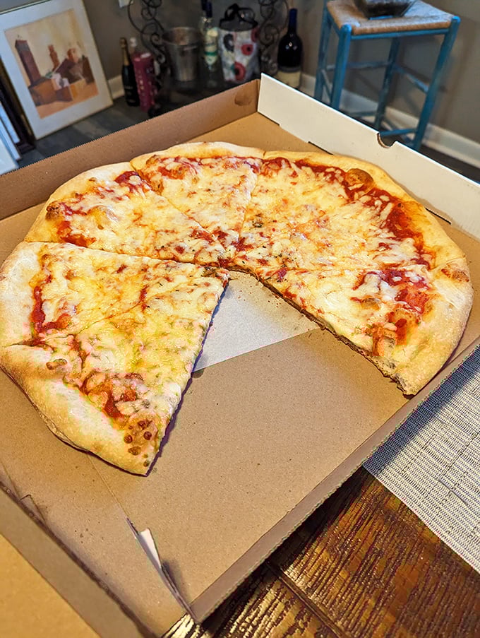 Sometimes simplicity speaks volumes. This cheese pizza demonstrates the paradox that the most basic things are often the hardest to perfect—and they've nailed it.