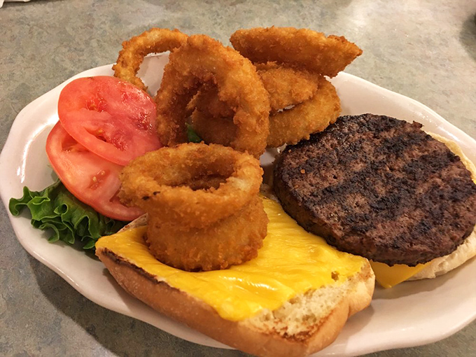 The cheeseburger and onion rings combo—proof that simplicity, when executed perfectly, beats culinary gymnastics every time.