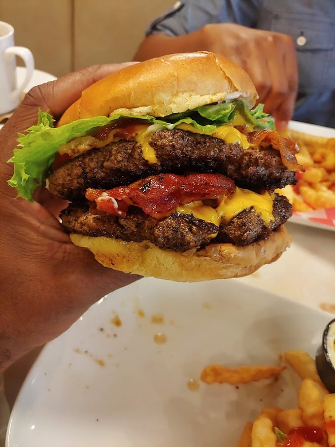 This towering cheeseburger understands that more is more, and apologies are for people who ordered salads instead.
