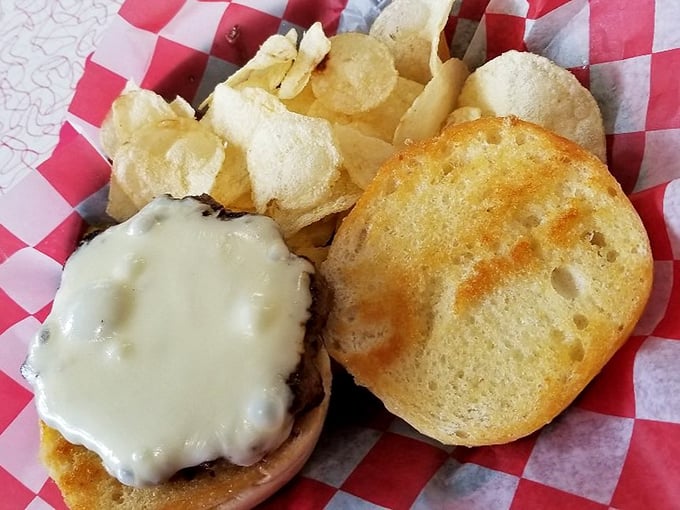 A proper diner cheeseburger doesn't need fancy toppings or pretentious presentation&mdash;just honest ingredients on a perfectly toasted bun with crispy chips.