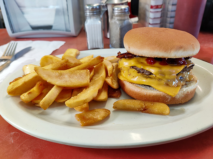The cheeseburger that launched a thousand cravings, complete with golden fries that somehow make Monday meetings more bearable.