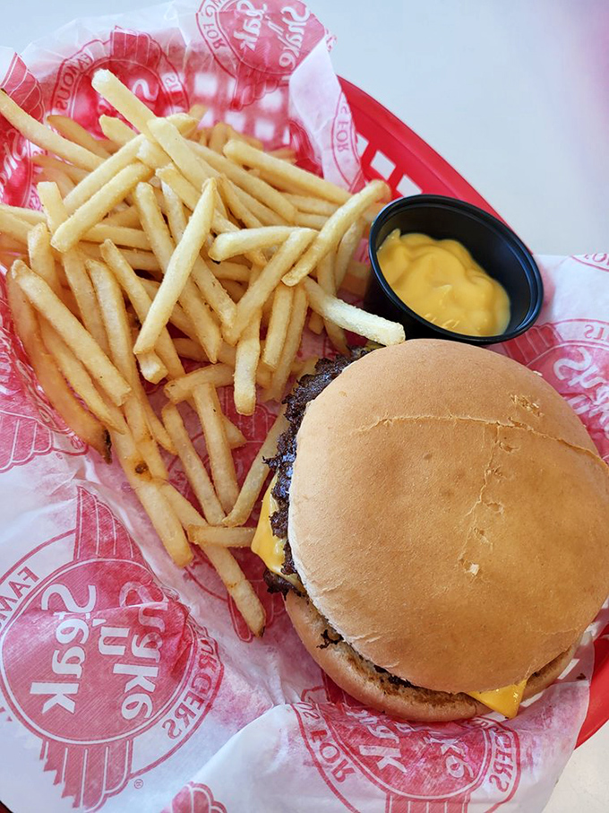 The humble cheeseburger, elevated to art form. Those thin, crispy-edged patties are what dreams are made of.