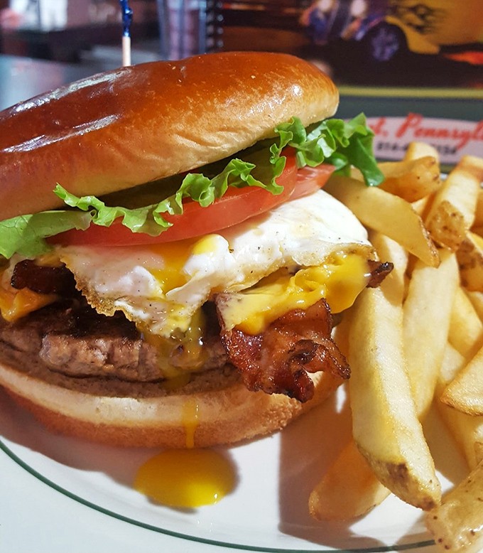 This isn't just a burger&mdash;it's edible architecture. The runny egg creates nature's perfect sauce, turning an ordinary lunch into a beautiful mess.