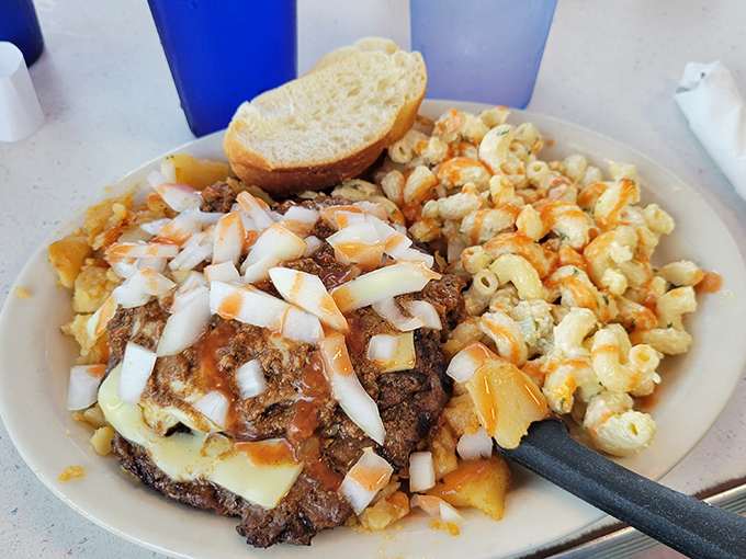 This isn't just a cheeseburger&mdash;it's a masterclass in diner cuisine, complete with mac salad that somehow makes everything better.
