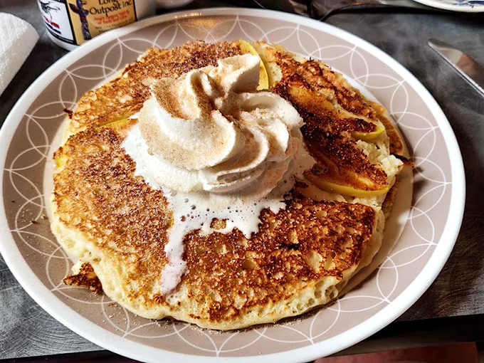 Pancakes shouldn't wear whipped cream like a hat unless they've earned it. These cheesecake flapjacks have definitely earned their crowning glory and then some.