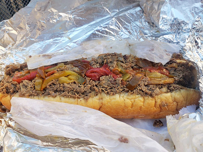 This cheesesteak isn't just a sandwich; it's a Philadelphia birthright wrapped in foil, waiting to change your life.