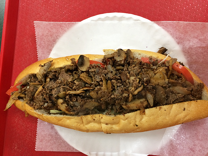 This cheesesteak isn't just a sandwich, it's a Pennsylvania tradition packed with savory meat, mushrooms, and onions that'll make your taste buds dance.