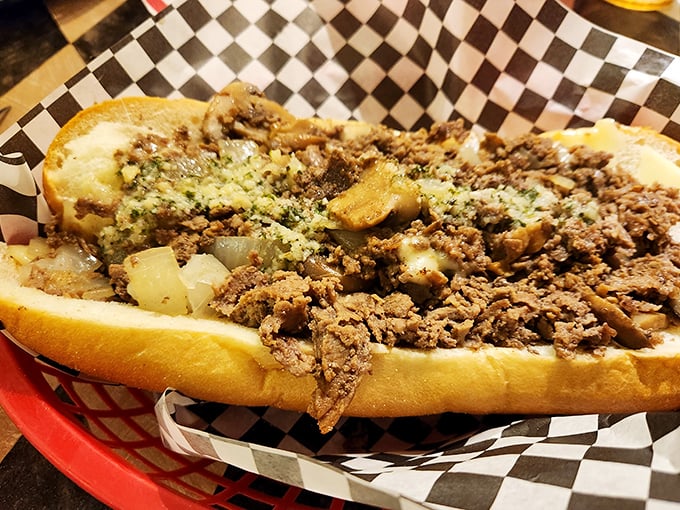 A proper cheesesteak should require a strategy to eat &ndash; this mountain of seasoned meat and melted cheese demands both hands and several napkins.