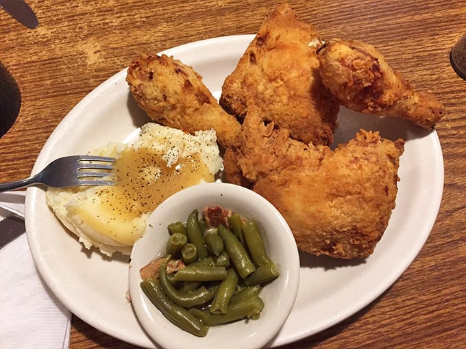 Broasted chicken that's somehow both crispy and juicy, with green beans that haven't forgotten their Southern roots. Comfort on a plate.