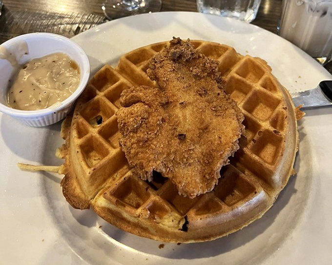 Chicken and waffles: the culinary odd couple that works better than peanut butter and chocolate. A symphony of crispy, fluffy, and savory.