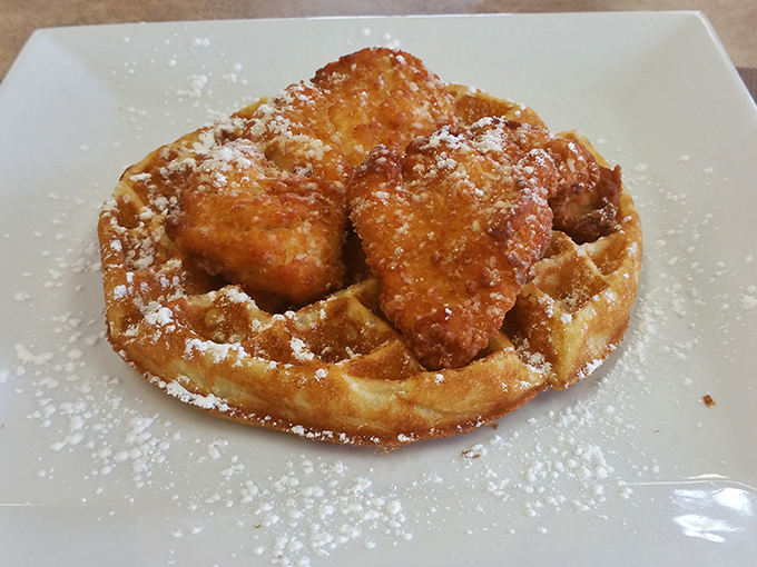 Chicken and waffles: where breakfast and lunch stopped fighting and decided to create something beautiful together, dusted with powdered sugar peace offerings.