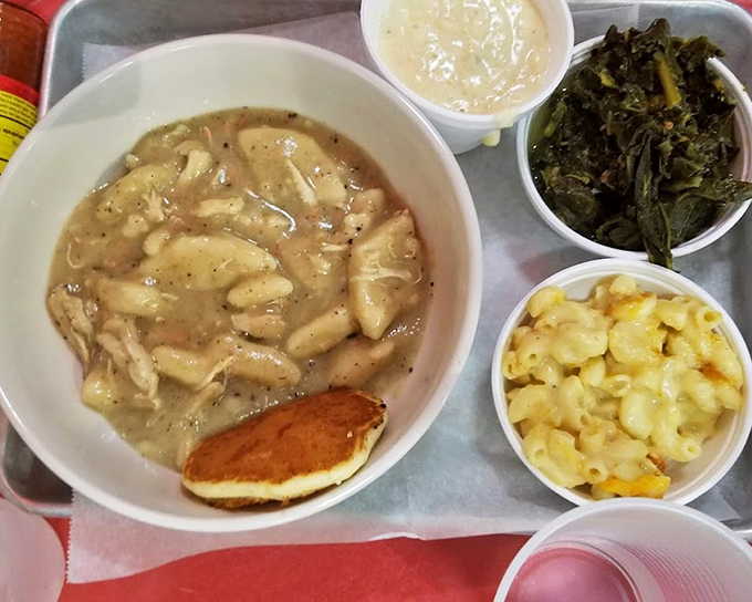 Chicken and dumplings swimming in savory broth, with cornbread and sides that make you want to call your grandmother with compliments.