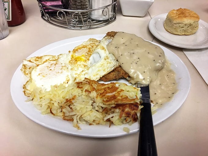 Chicken fried steak smothered in gravy with eggs and hash browns. If comfort food were an Olympic event, this would take gold every time. 