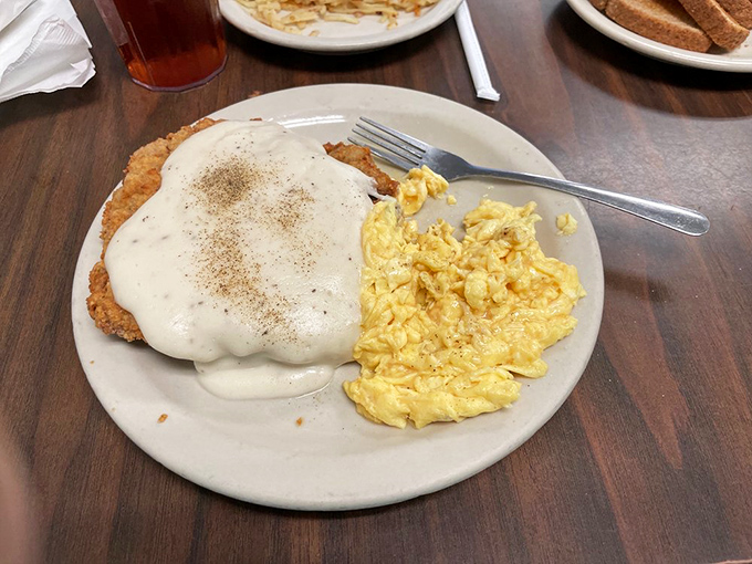 Chicken fried steak that extends beyond the plate's boundaries, smothered in peppery cream gravy&mdash;a Texas tradition that requires both a fork and a commitment.