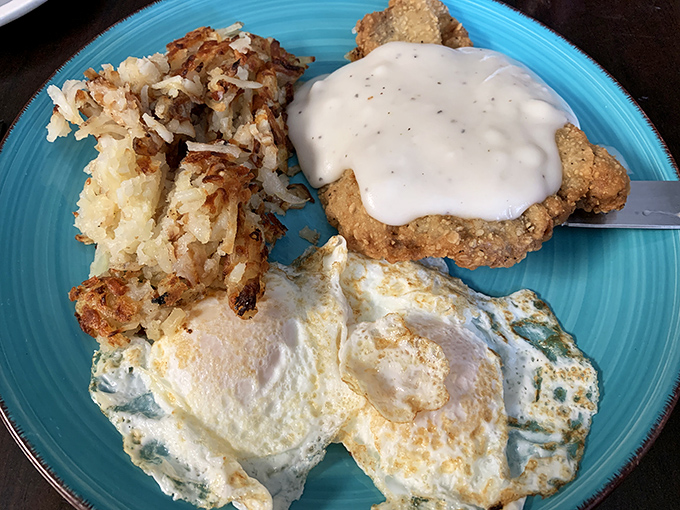 The chicken fried steak comes smothered in country gravy so good you'll be tempted to drink what's left with a straw.