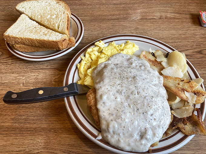 This chicken fried steak doesn't just come with gravy&mdash;it's practically swimming in a pool of peppery goodness that demands to be sopped up.