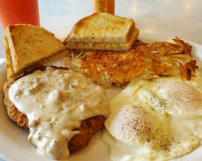 Chicken fried steak with gravy, eggs, and hash browns&mdash;the breakfast equivalent of hitting a culinary royal flush.
