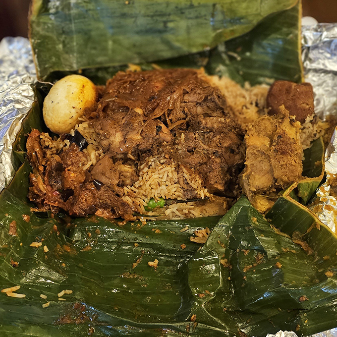 Unwrapping lamprais is like opening a present on your taste buds&mdash;banana leaf-steamed rice and curry creating aromatic magic that no gift box could contain.