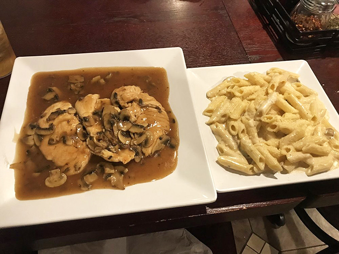 Chicken marsala swimming in mushroom gravy beside creamy pasta &ndash; comfort food that could solve world peace.