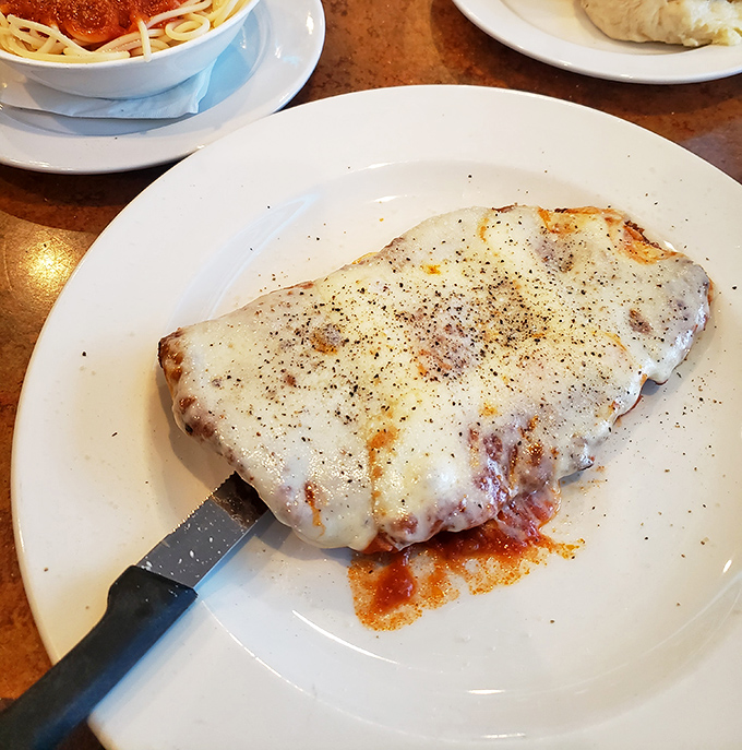 This chicken parm isn't just dinner&mdash;it's a blanket of melted cheese tucking in a perfectly breaded cutlet for a saucy night's sleep.