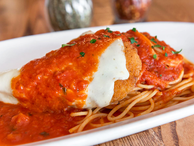 Chicken Parmesan that could make Tony Soprano weep with joy. The sauce-to-cheese ratio achieves what most peace treaties can only dream of.