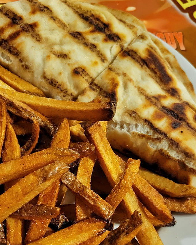 Grill marks don't lie! This flatbread's beautiful char tells you everything about the care taken in this kitchen.