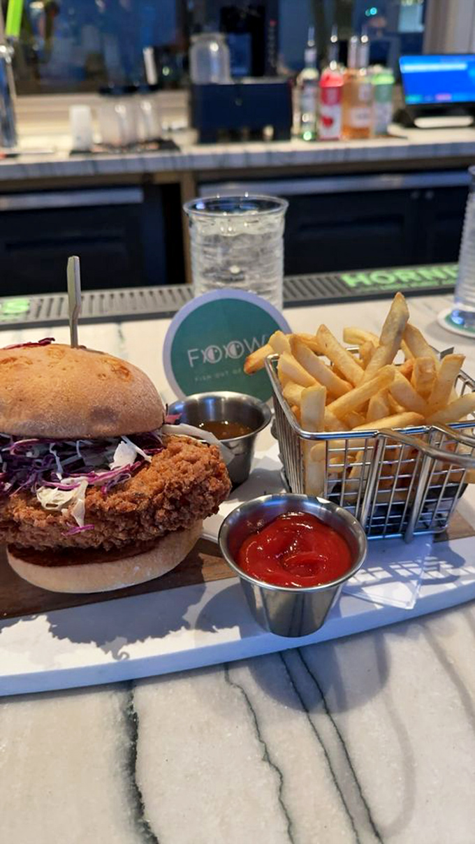 Crispy perfection meets artful presentation in this fried chicken sandwich &ndash; a masterclass in comfort food elevated to destination-worthy status.
