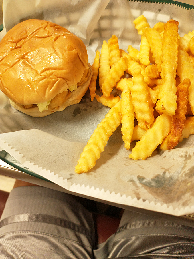 This isn't just a sandwich; it's architectural perfection with crispy fries that would make a Frenchman weep with joy.