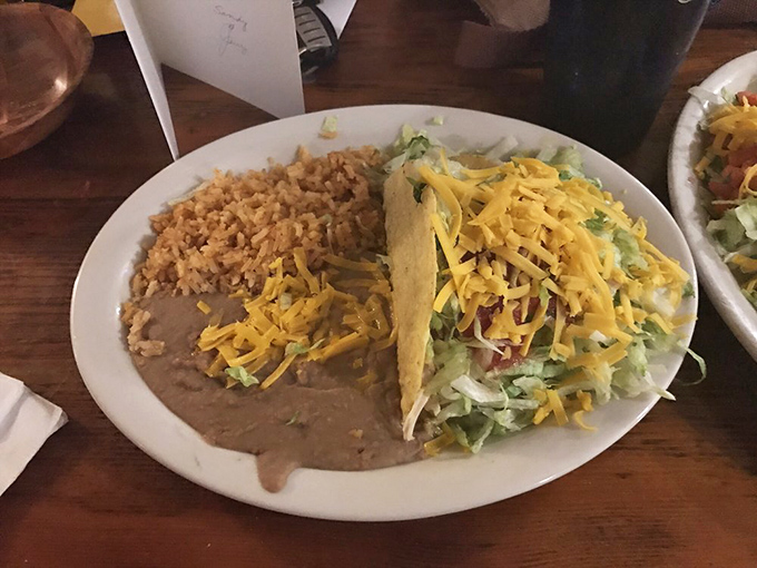A proper taco plate comes with all the fixings&mdash;rice, beans, and enough cheese to make Wisconsin nervous.