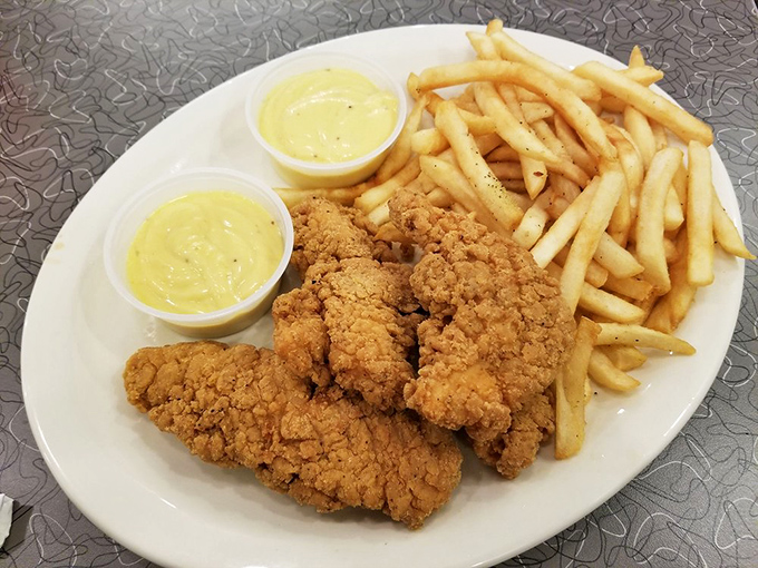 Comfort food gets its PhD at The Arcade. These golden-battered chicken tenders with their crispy, craggy exterior would make Colonel Sanders weep with jealousy.