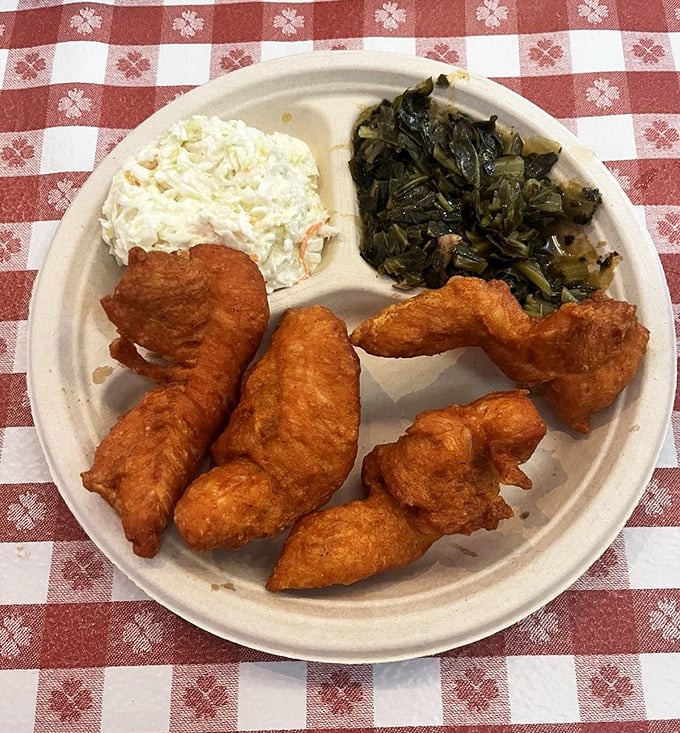 Tender strips of chicken alongside collard greens that have stories to tell. This plate doesn't need fancy plating&mdash;it's too busy changing lives.