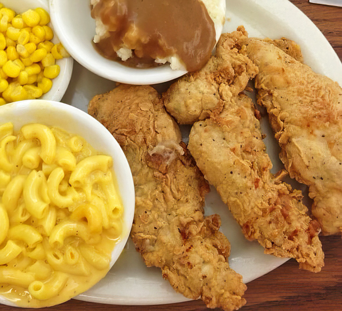 Golden-fried chicken tenders with mac and cheese that doesn't just speak to your inner child &ndash; it throws a full-blown reunion party.