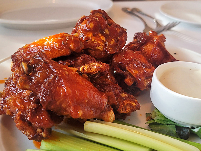 These aren't just wings; they're crispy, sauce-lacquered flavor bombs that make you wonder why we ever invented forks in the first place.