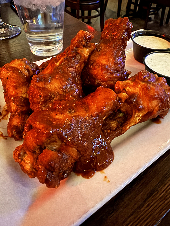 These wings aren't just coated in sauce&mdash;they're baptized in it. The kind of messy indulgence that makes you grateful for extra napkins and forgiving friends.