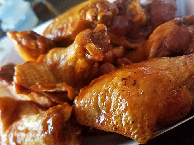 Wings that make you understand why napkins were invented. That glossy sauce isn't just coating the chicken&mdash;it's sealing in a promise of flavor.