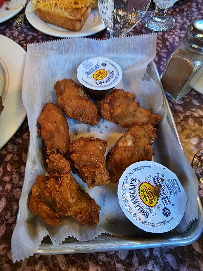 The plot twist at this steakhouse? Wings that could make Buffalo jealous. Crispy, golden-brown messengers of joy served with no pretense.