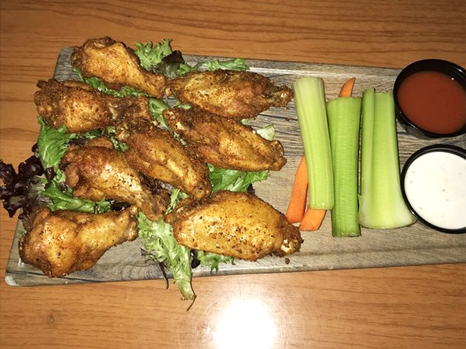 Wings that don't just fly&mdash;they soar with flavor. Perfectly crispy on the outside, juicy on the inside, with cooling veggies standing by.