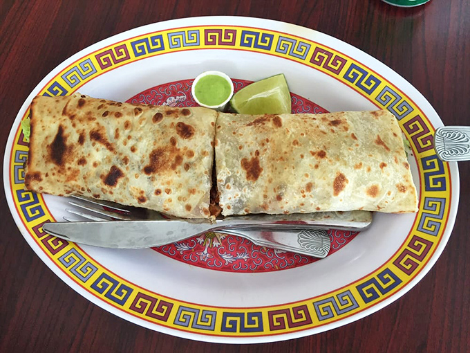 This wrap isn't just lunch&mdash;it's edible architecture. Perfectly grilled flatbread embraces savory fillings like a warm hug from your favorite aunt.