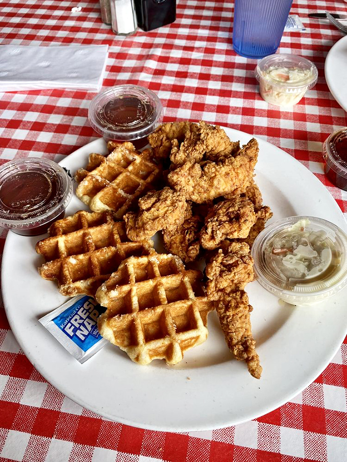 Whoever first paired chicken with waffles deserves a Nobel Prize. This plate proves some relationships are meant to last forever.